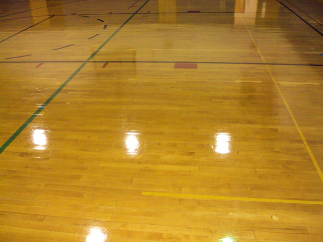 Zig’s STS Wood Gym Floor Restoration | Zig's Stone and Tile Services